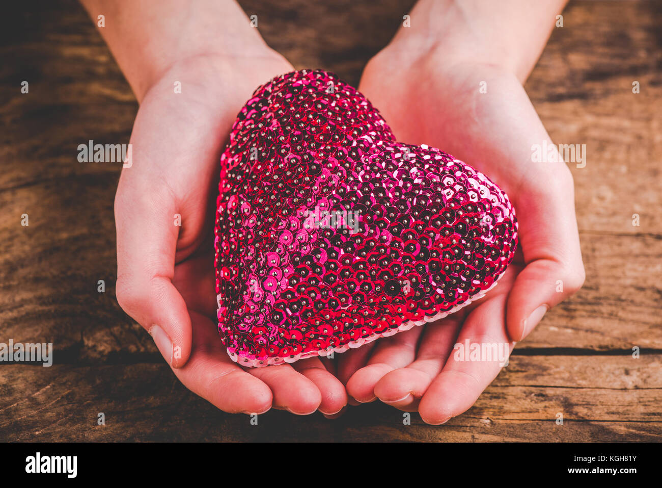 with heart in hands Stock Photo - Alamy