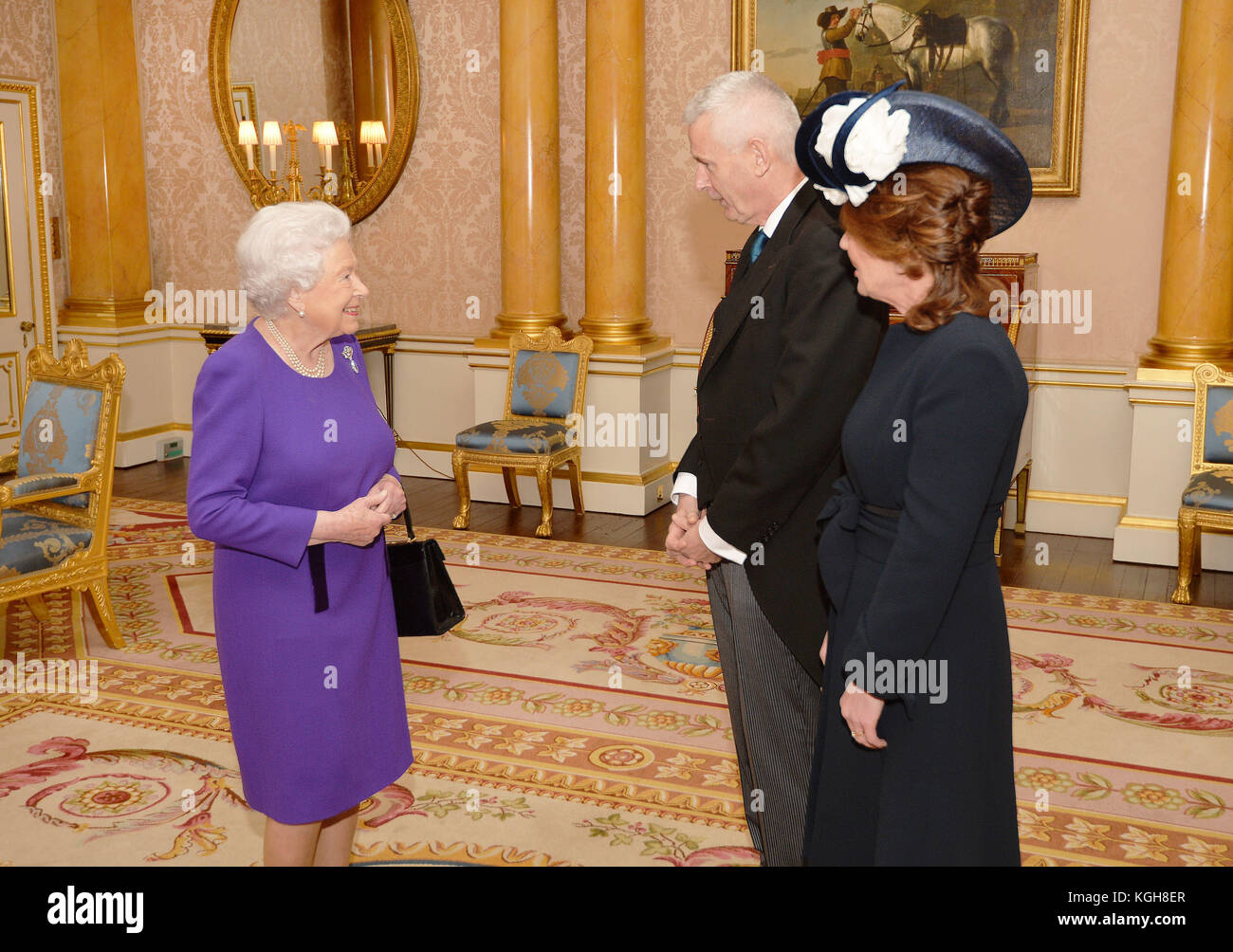 Queen Elizabeth II talks with Adrian O'Neill, the Irish Ambassador to ...