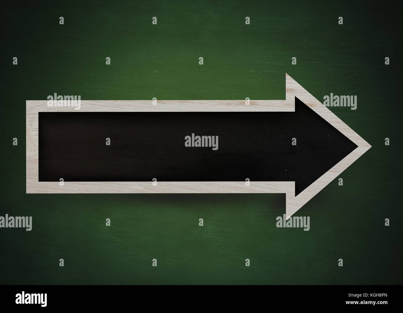 Digital composite of Blackboard arrow sign on green blackboard Stock ...
