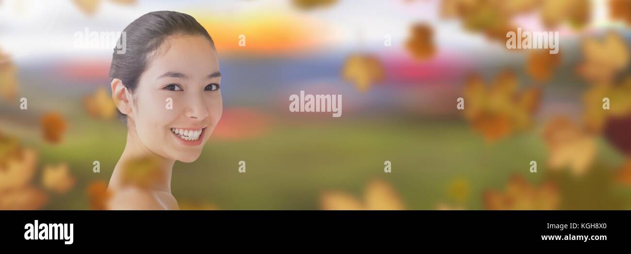 Digital composite of Woman's face in landscape with leaves Stock Photo ...