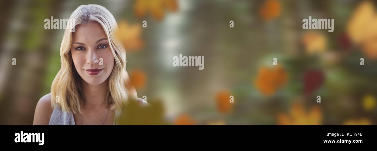 Digital composite of Woman's face in forest with leaves Stock Photo - Alamy