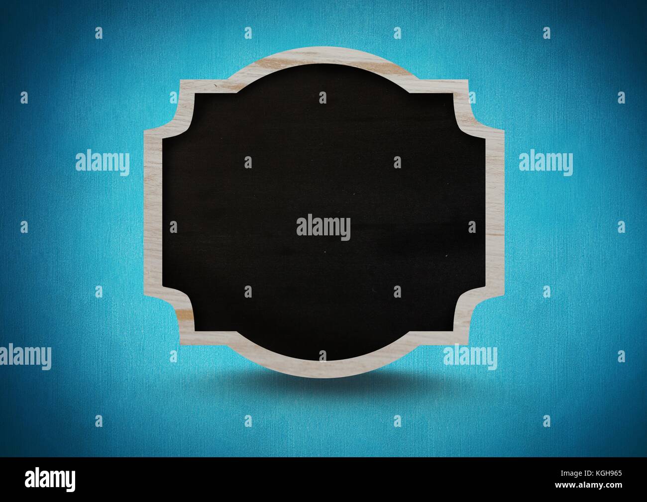 Digital composite of Blackboard sign on blue background Stock Photo - Alamy