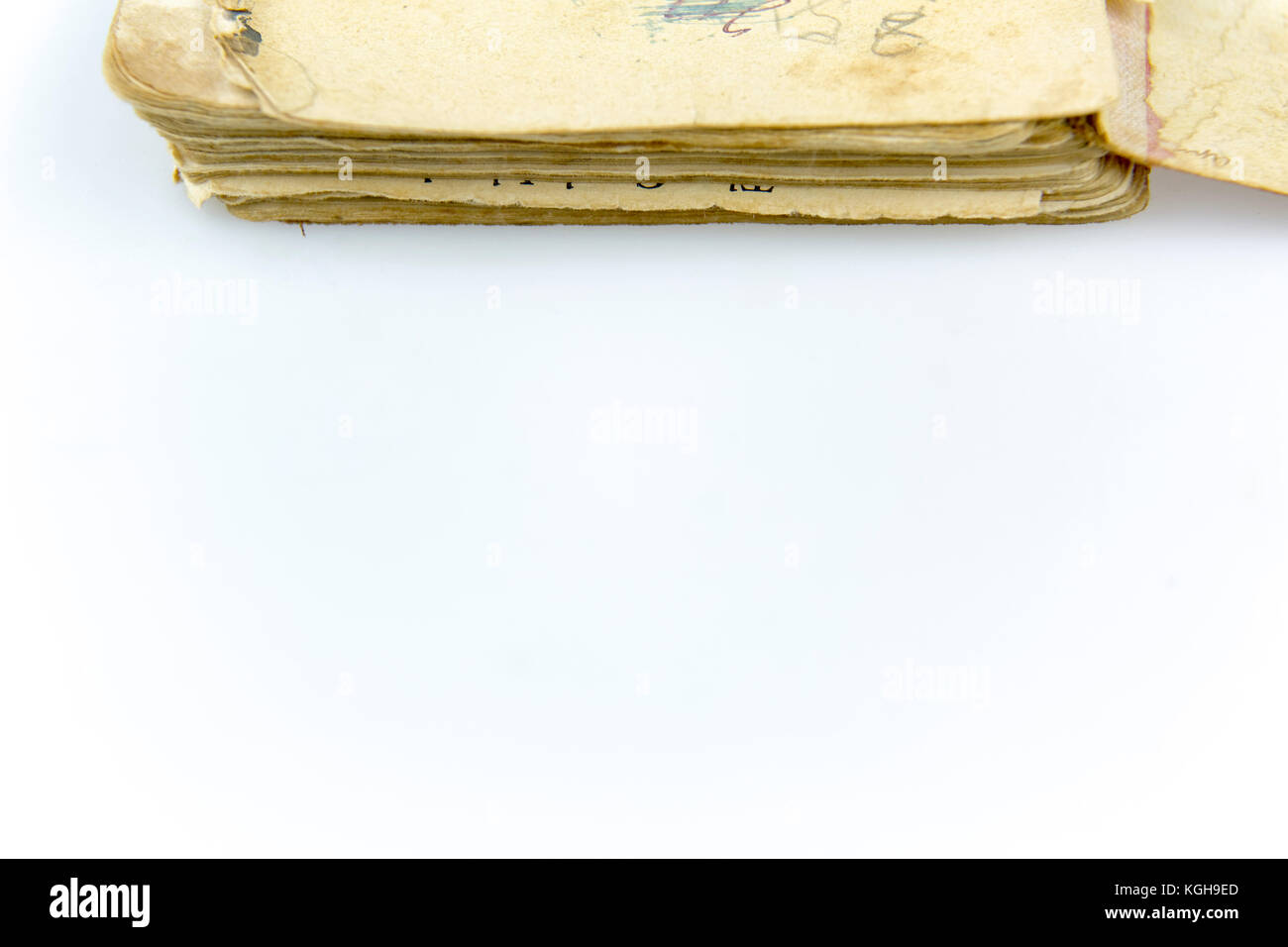 Old antique book with bent page edges on white. Vintage print ...