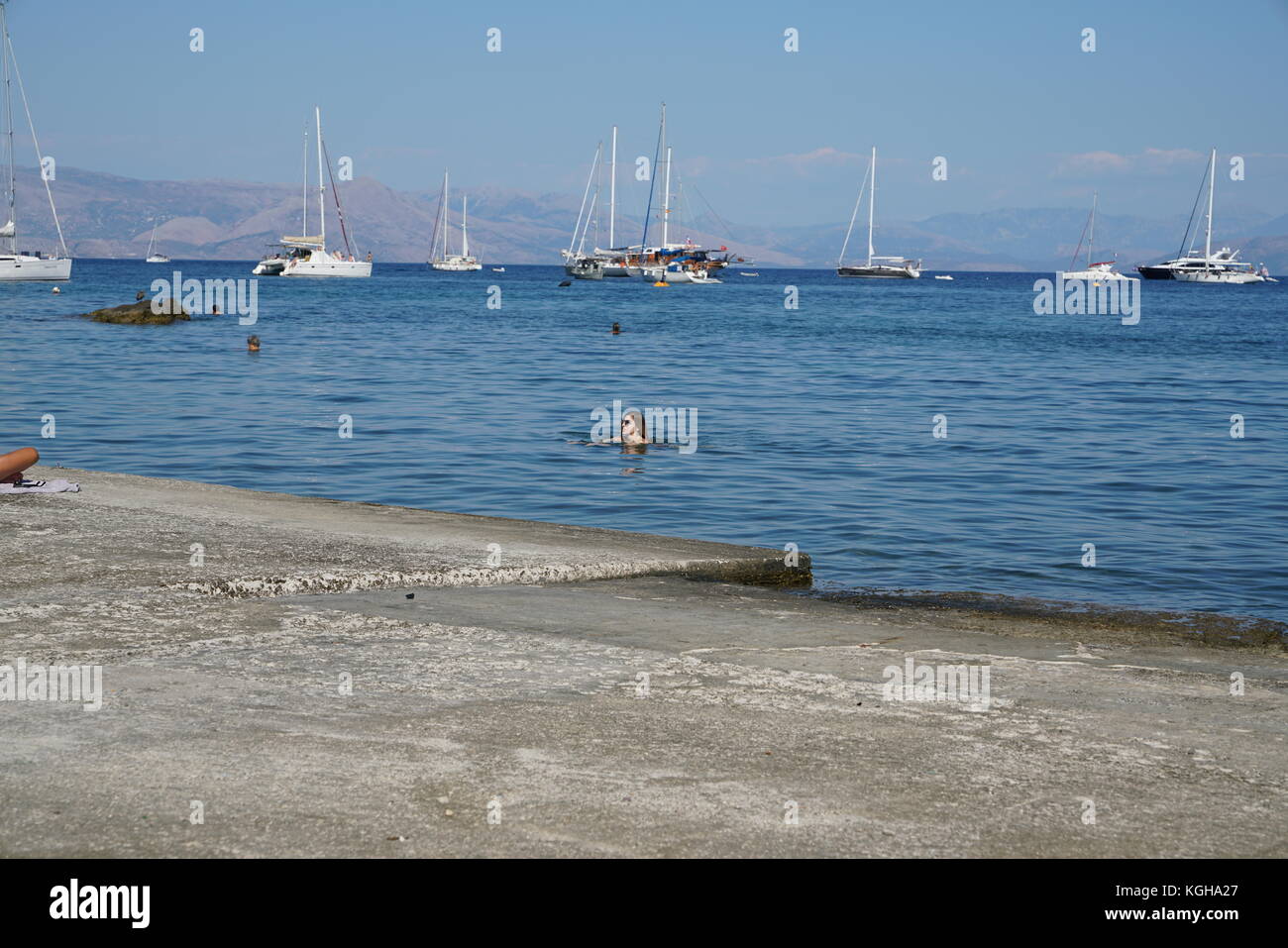 Corfu, Greece: People at the beach Stock Photo - Alamy