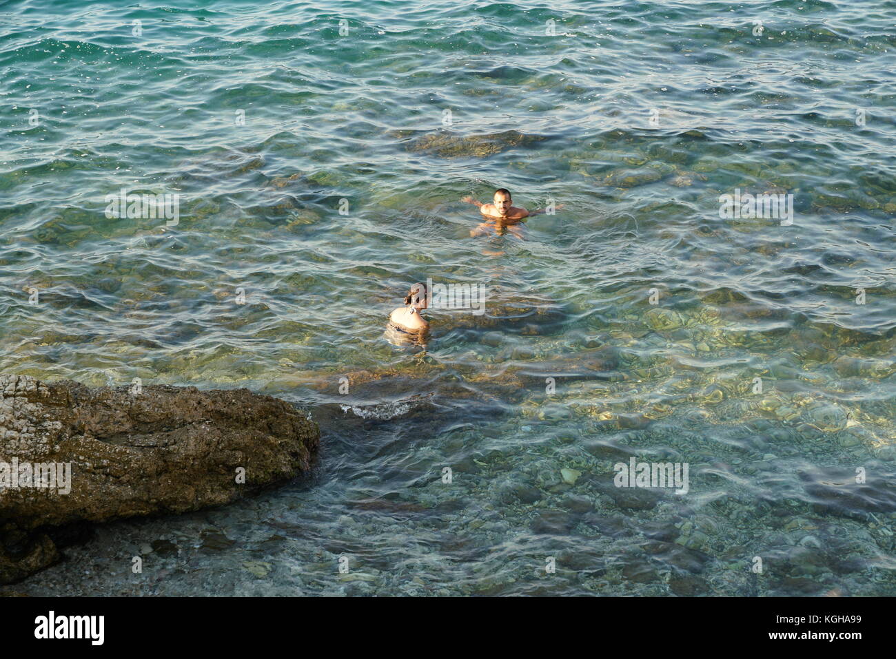 Corfu, Greece: People at the beach Stock Photo - Alamy
