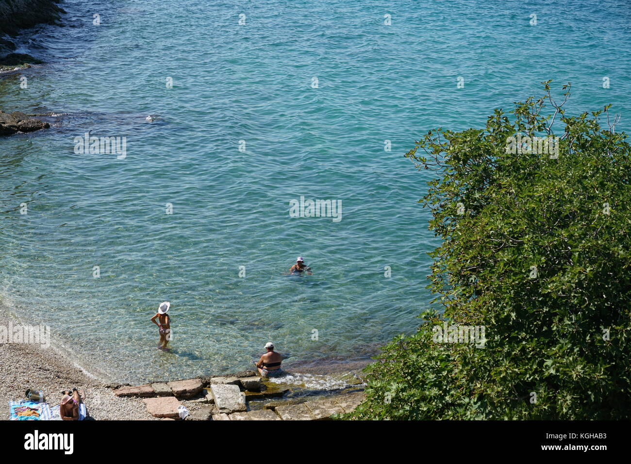 Corfu, Greece: People at the beach Stock Photo - Alamy