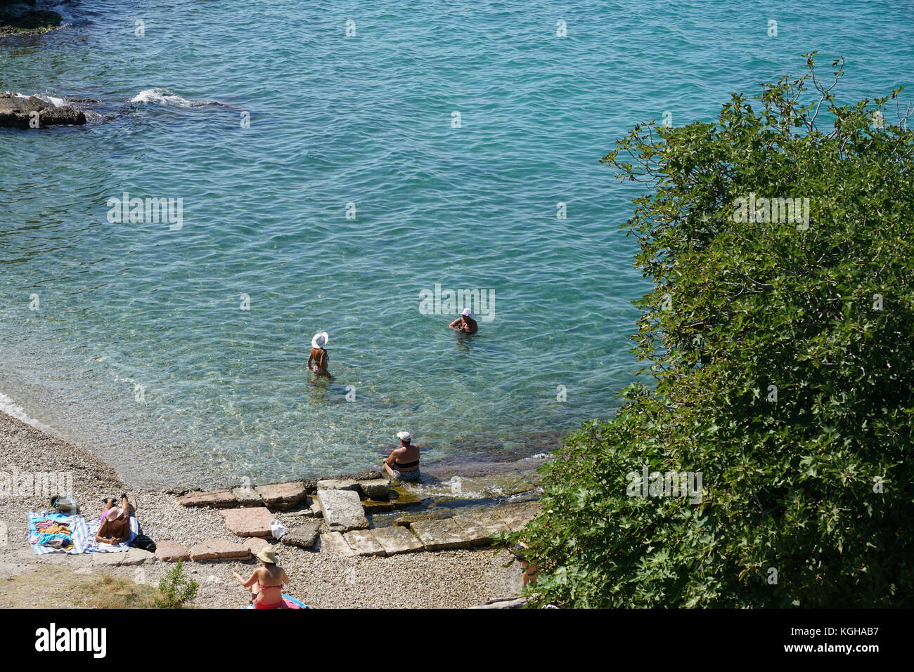 Corfu, Greece: People at the beach Stock Photo - Alamy