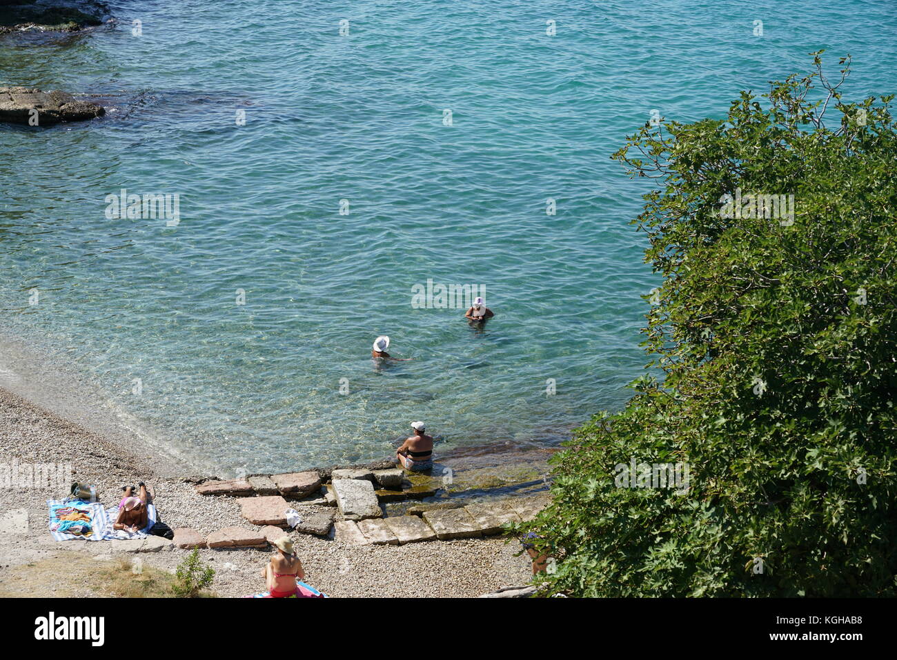 Corfu, Greece: People at the beach Stock Photo - Alamy