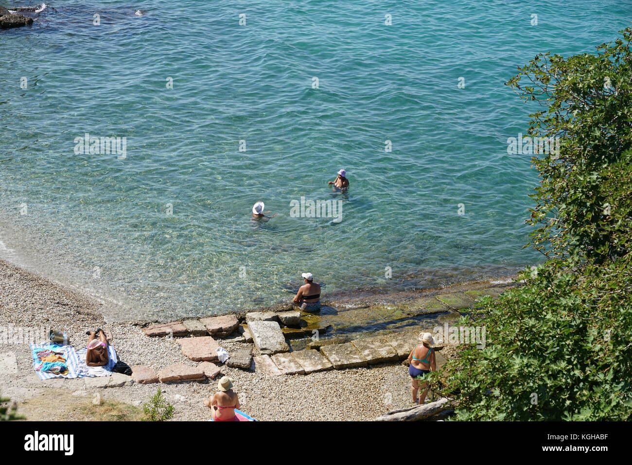 Corfu, Greece: People at the beach Stock Photo - Alamy