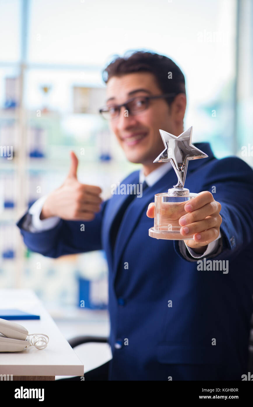 Businessman winning best employee of the month award Stock Photo - Alamy