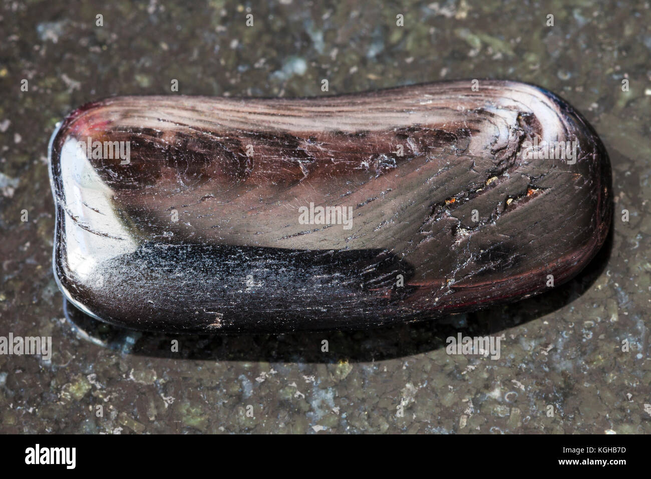 macro shooting of natural mineral rock specimen - tumbled Hypersthene ...