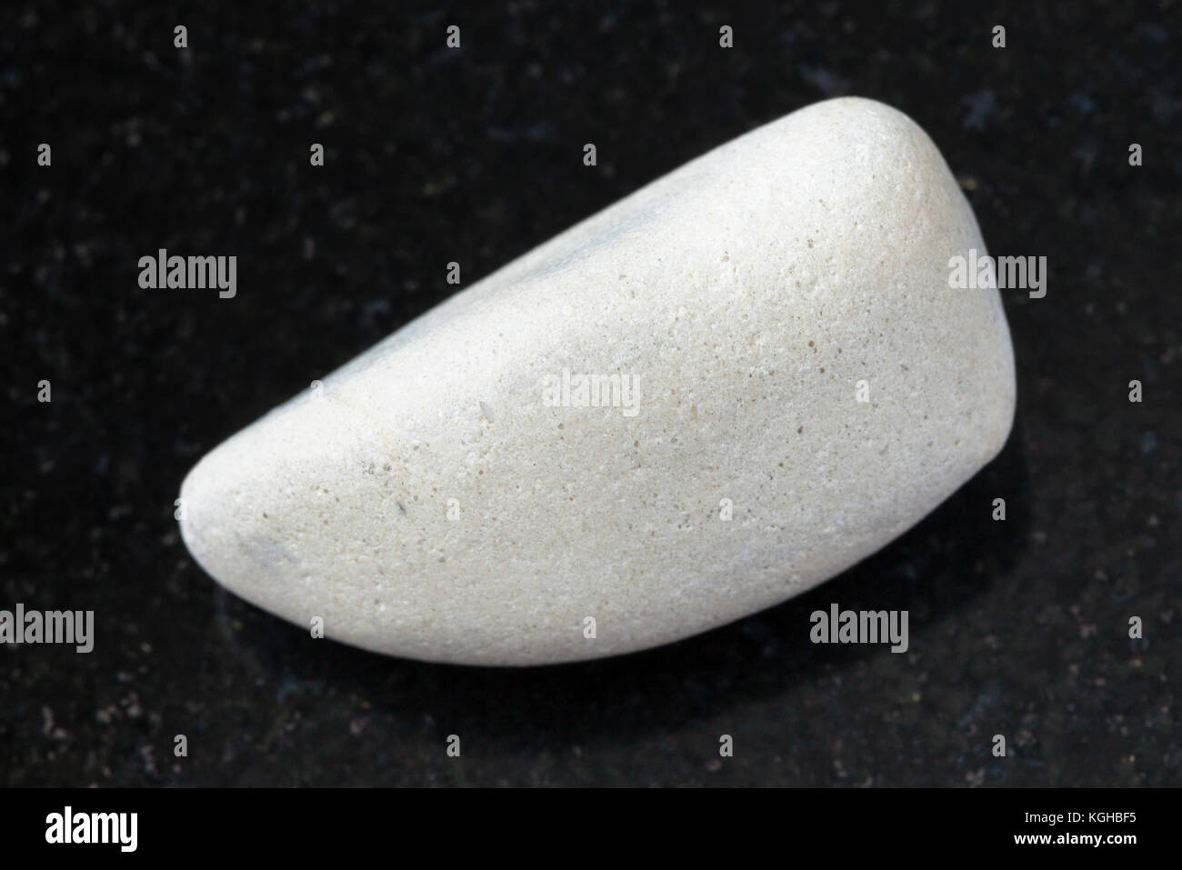 macro shooting of natural mineral rock specimen - polished white ...