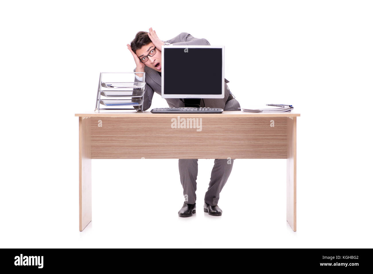 Businessman hiding in the office isolated on white Stock Photo - Alamy