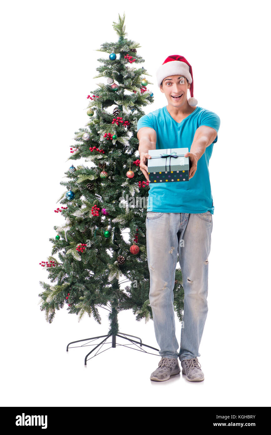 Young man decorating christmas tree isolated on white Stock Photo - Alamy