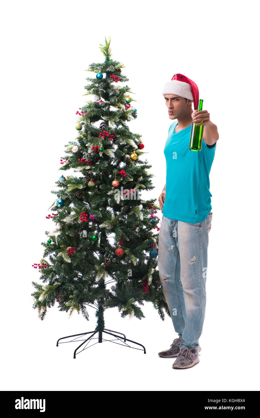 Young man decorating christmas tree isolated on white Stock Photo - Alamy