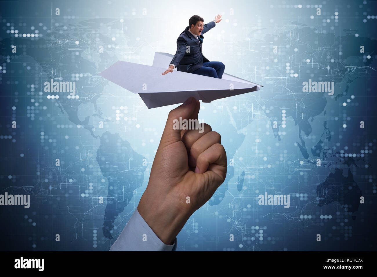 Businessman flying on paper plane in business concept Stock Photo - Alamy