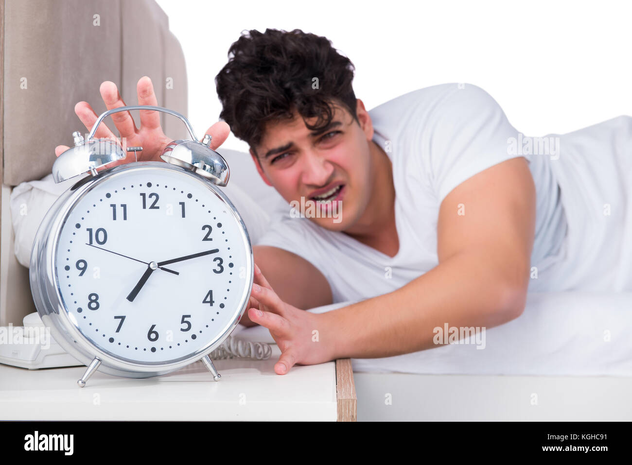 Man in bed suffering from insomnia Stock Photo - Alamy