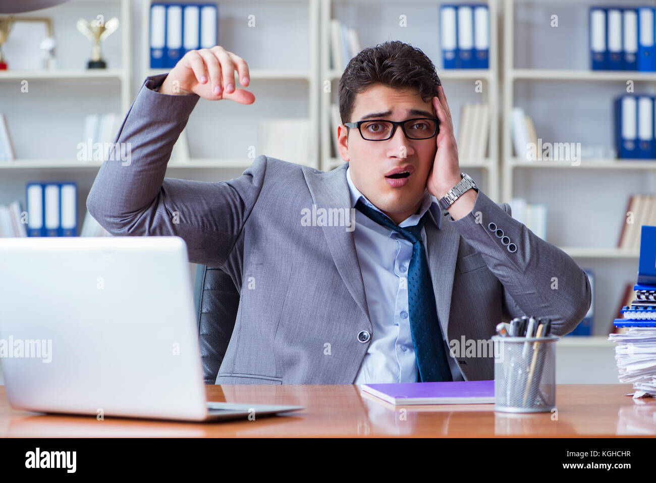 Businessman sweating excessively smelling bad in office at workplace ...