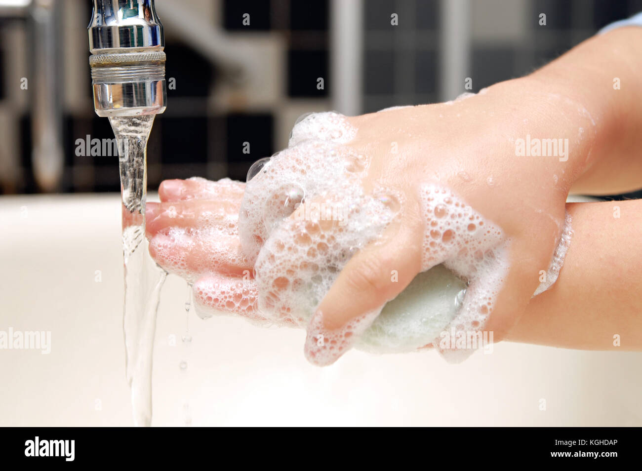 Small girl hand washing hi-res stock photography and images - Alamy