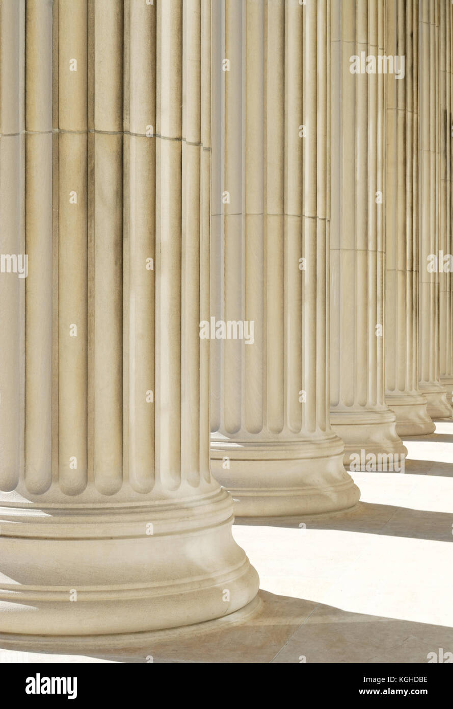 Strong foundation. Classic columns background Stock Photo - Alamy