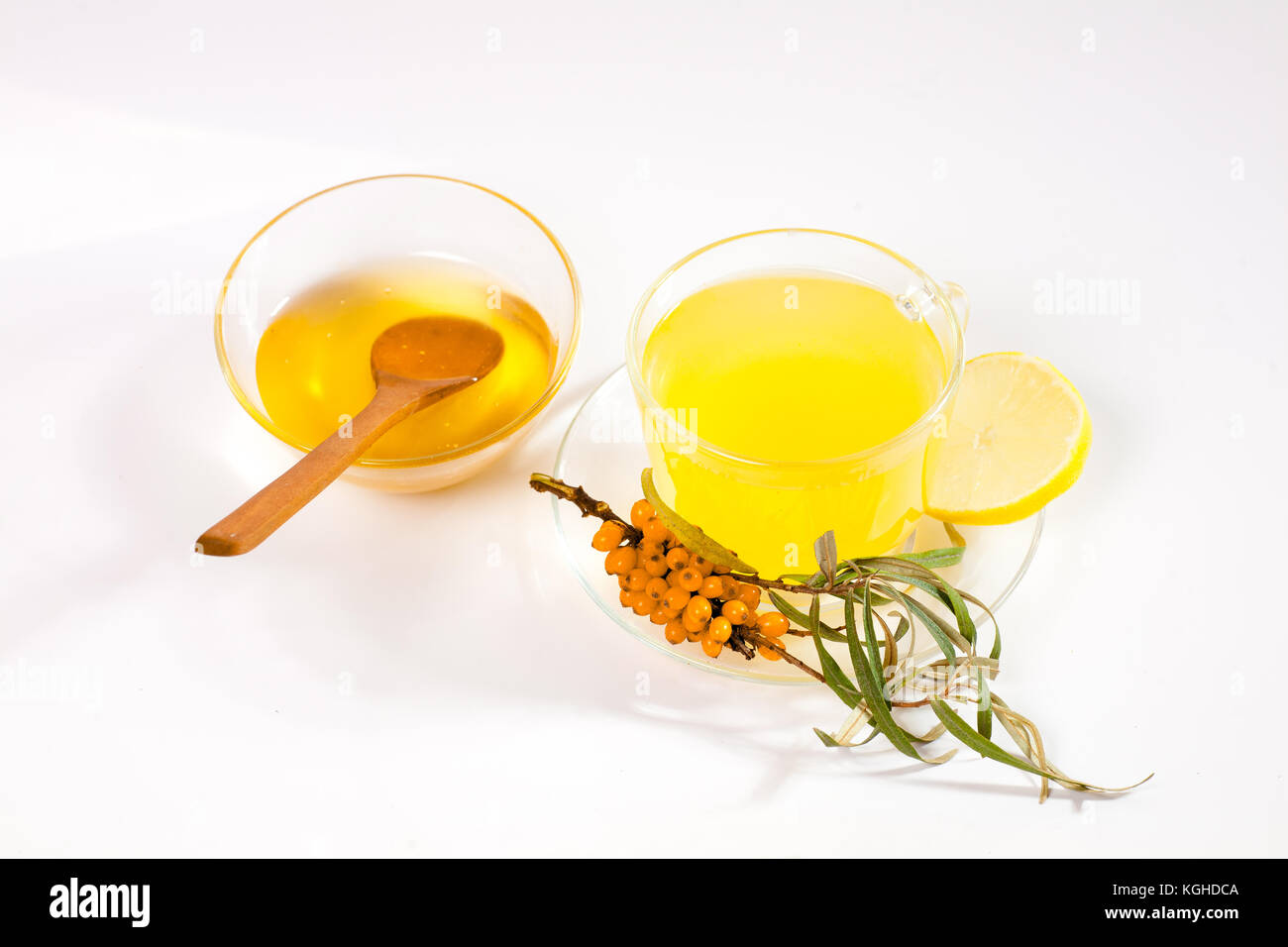 Sea buckthorn tea with a on white background Stock Photo - Alamy