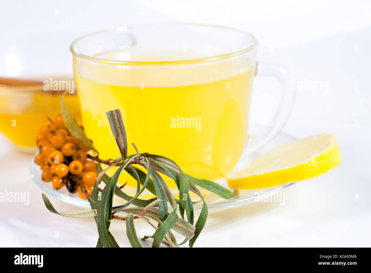 Sea buckthorn tea with a on white background Stock Photo - Alamy