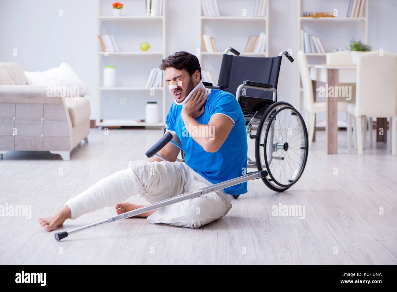 Injured young man recovering at home Stock Photo - Alamy