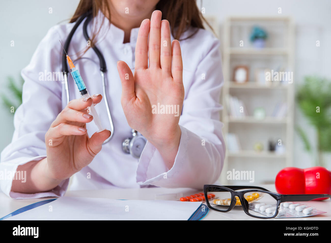 Doctor with syringe in the hospital Stock Photo - Alamy