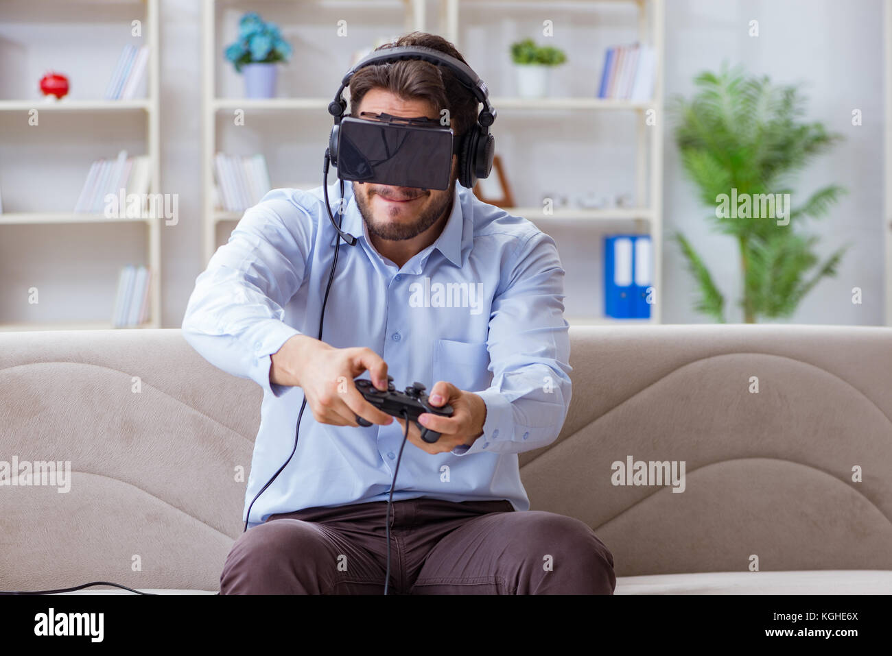 Student gamer playing games at home Stock Photo - Alamy