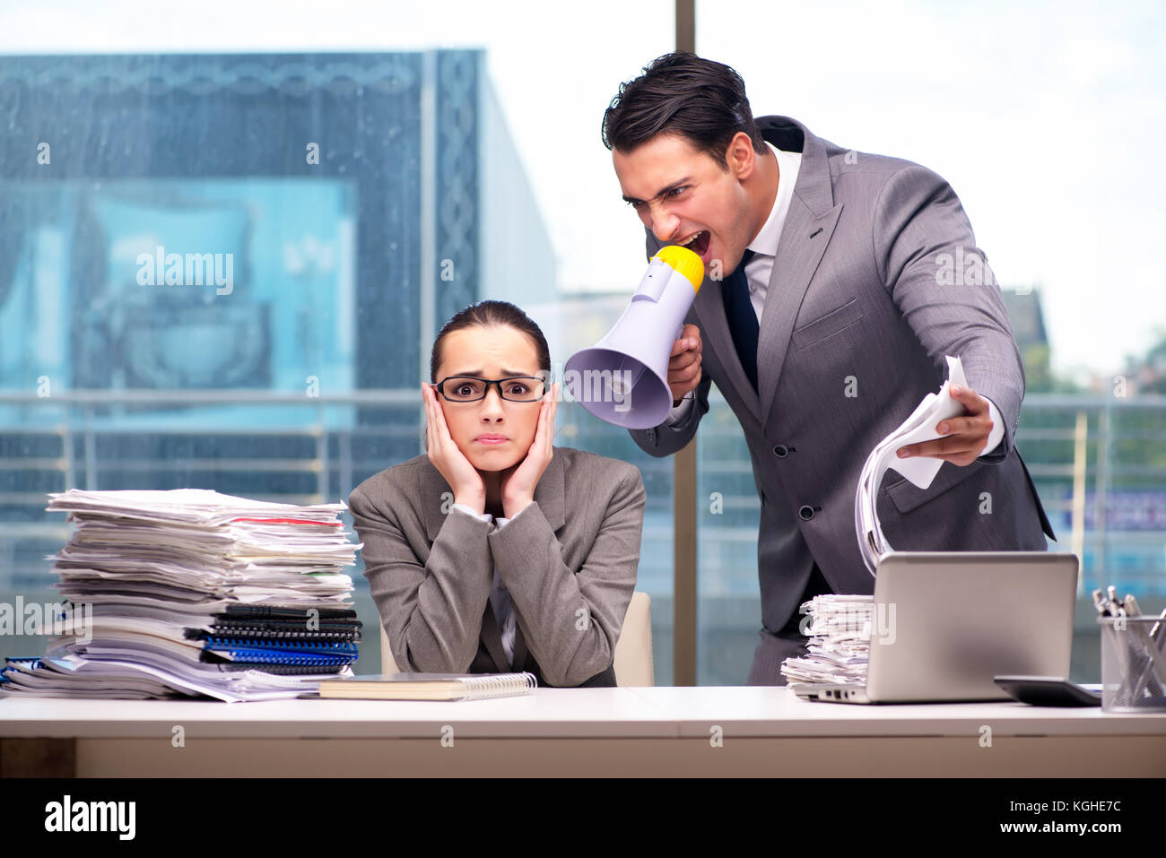 Boss yelling at his team member Stock Photo - Alamy