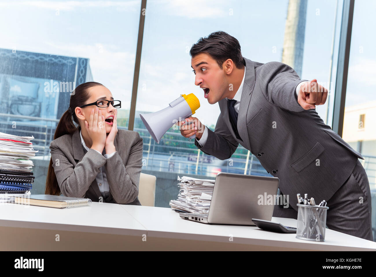 Boss yelling at his team member Stock Photo - Alamy