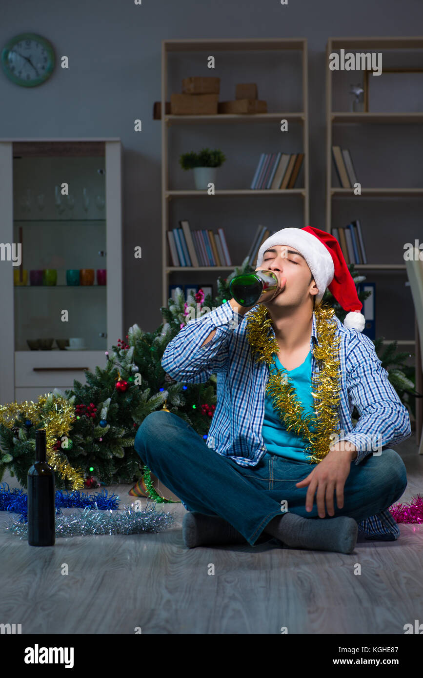 Man celebrating christmas at home alone Stock Photo - Alamy