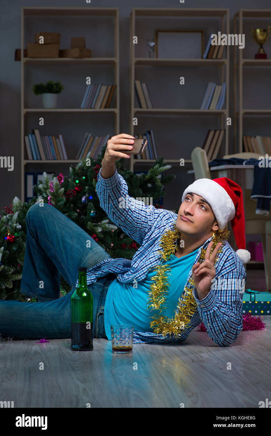 Man celebrating christmas at home alone Stock Photo - Alamy