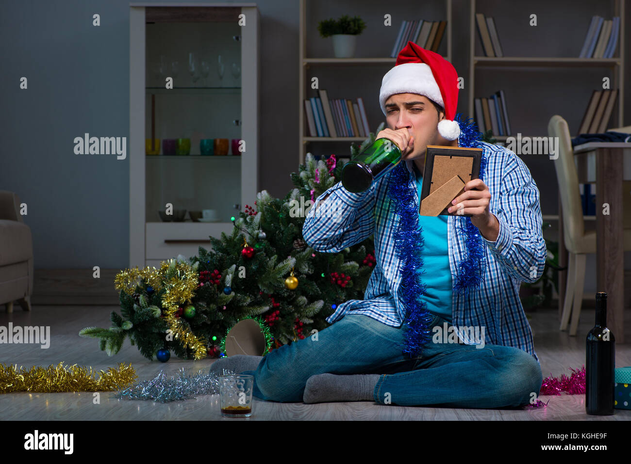 Man celebrating christmas at home alone Stock Photo - Alamy