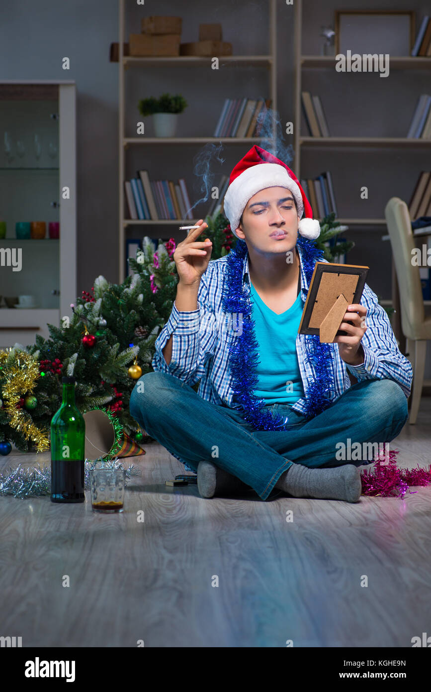 Man celebrating christmas at home alone Stock Photo - Alamy