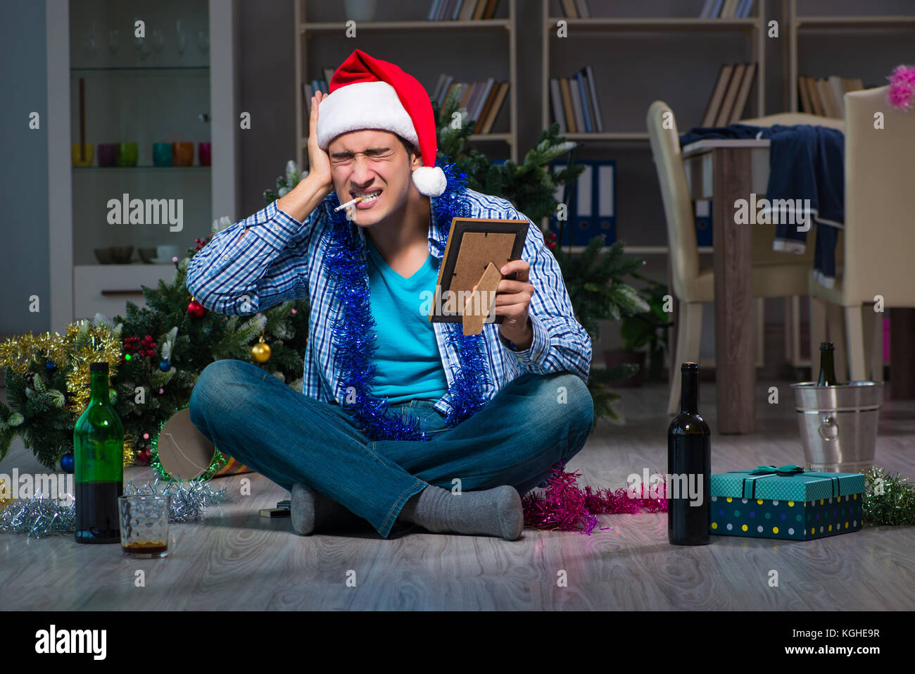 Man celebrating christmas at home alone Stock Photo - Alamy