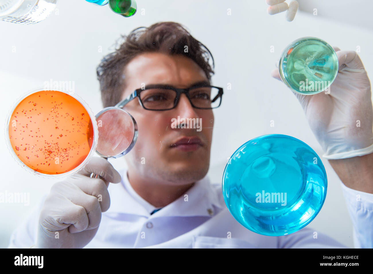Chemist working in the laboratory with hazardous chemicals Stock Photo ...