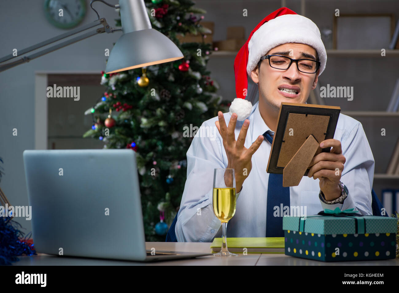 Businessman working late on christmas day in office Stock Photo - Alamy