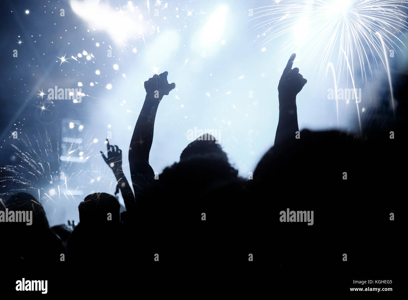 new Year concept - cheering crowd and fireworks Stock Photo - Alamy