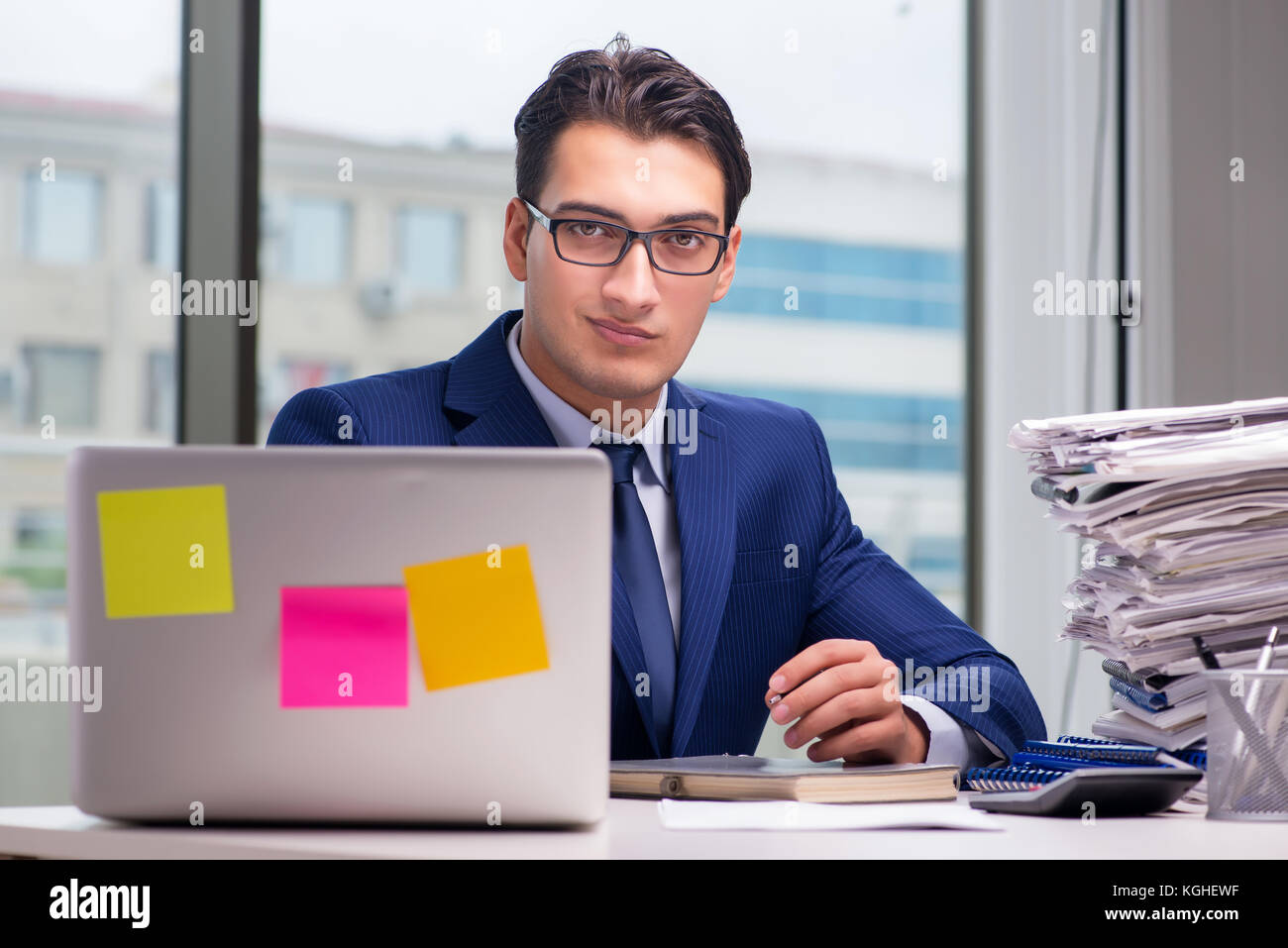 Workaholic businessman overworked with too much work in office Stock ...