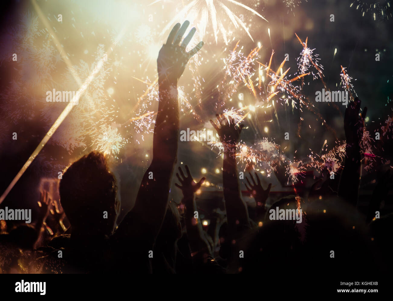 new Year concept - cheering crowd and fireworks Stock Photo - Alamy