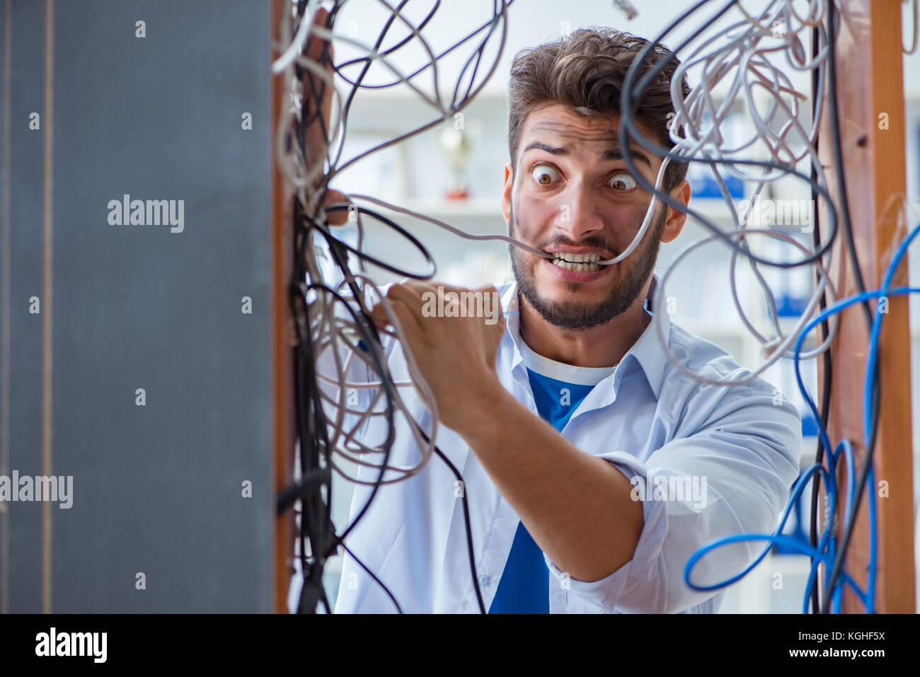 Untangle wires hi-res stock photography and images - Alamy