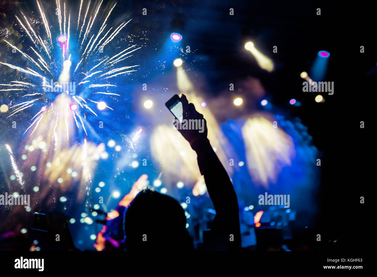 new Year concept - cheering crowd and fireworks Stock Photo - Alamy