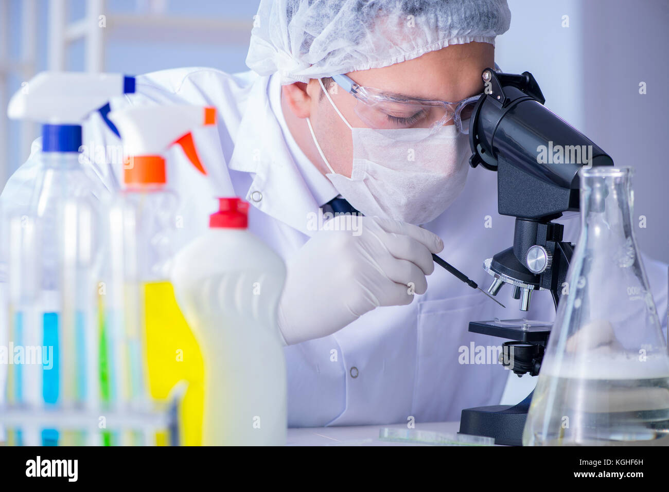 Man in the lab testing new cleaning solution detergent Stock Photo - Alamy
