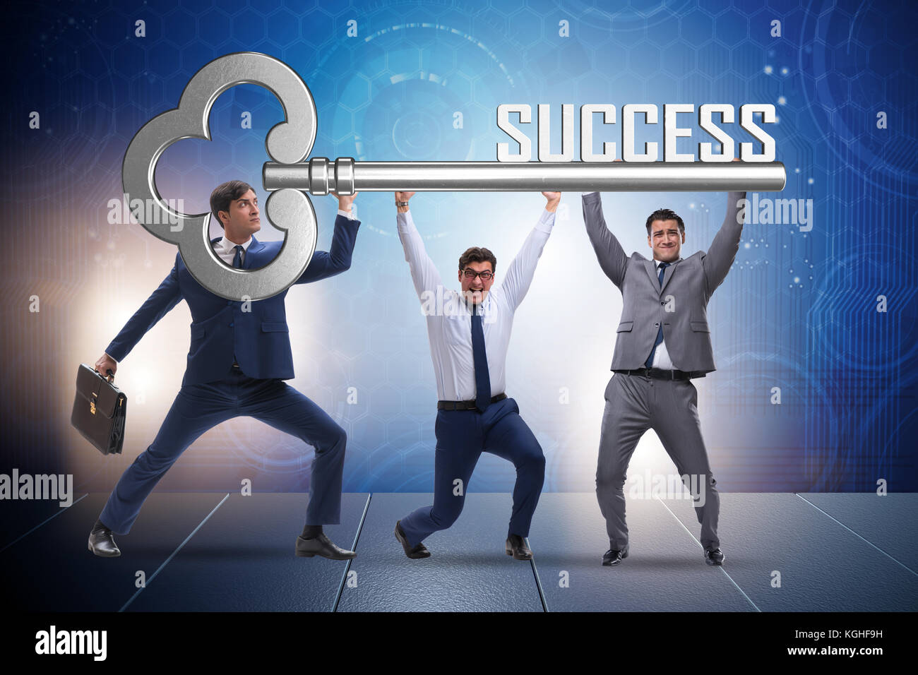 Businessmen holding giant key in business concept Stock Photo - Alamy