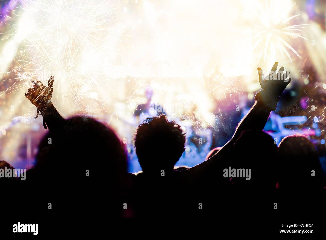 new Year concept - cheering crowd and fireworks Stock Photo - Alamy