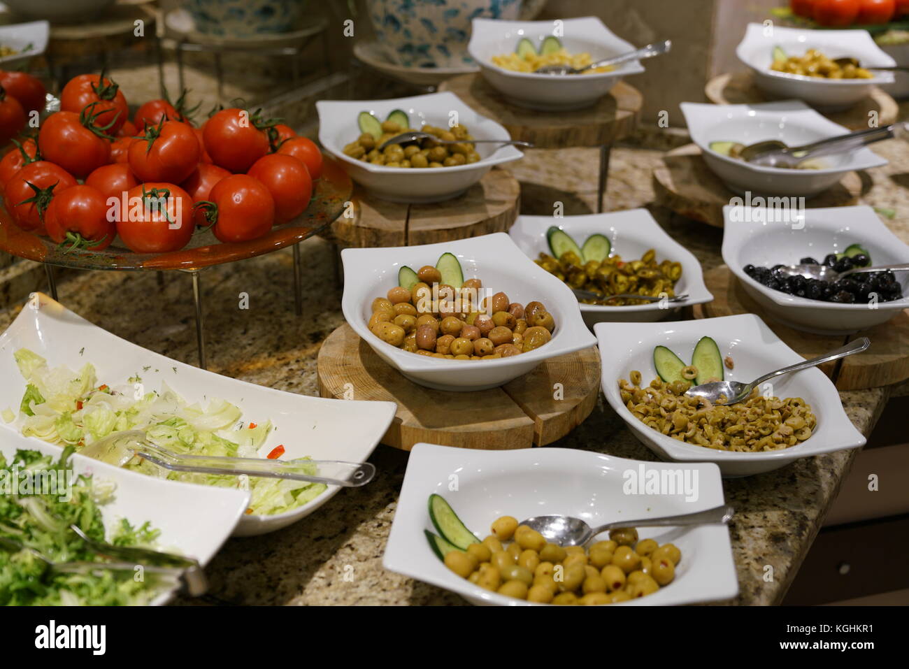 Olives buffet with vegetables Stock Photo - Alamy