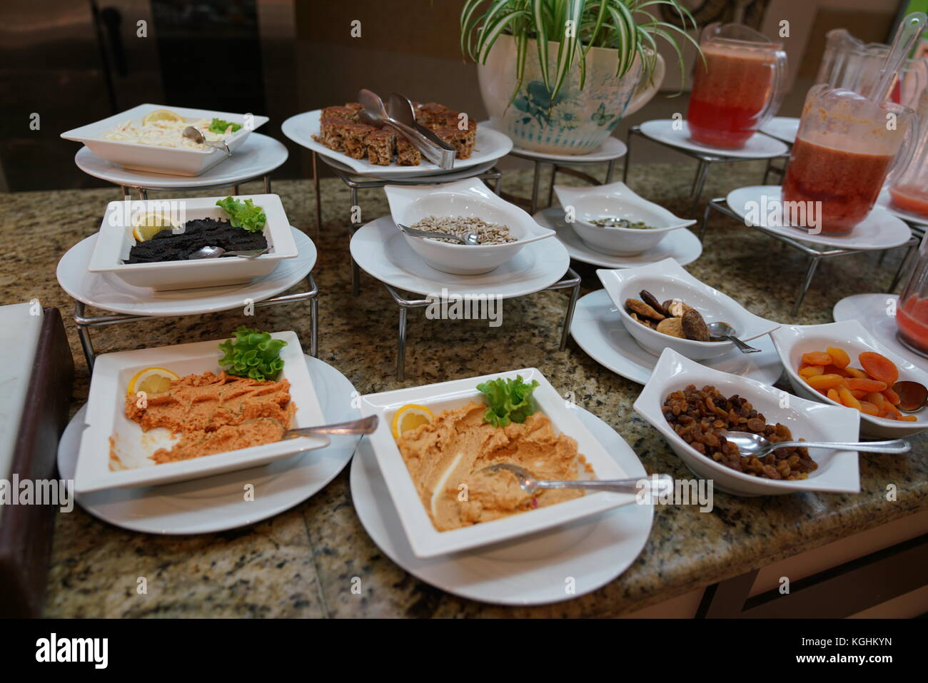 Dinner buffet with hummus and vegetables and candy Stock Photo - Alamy