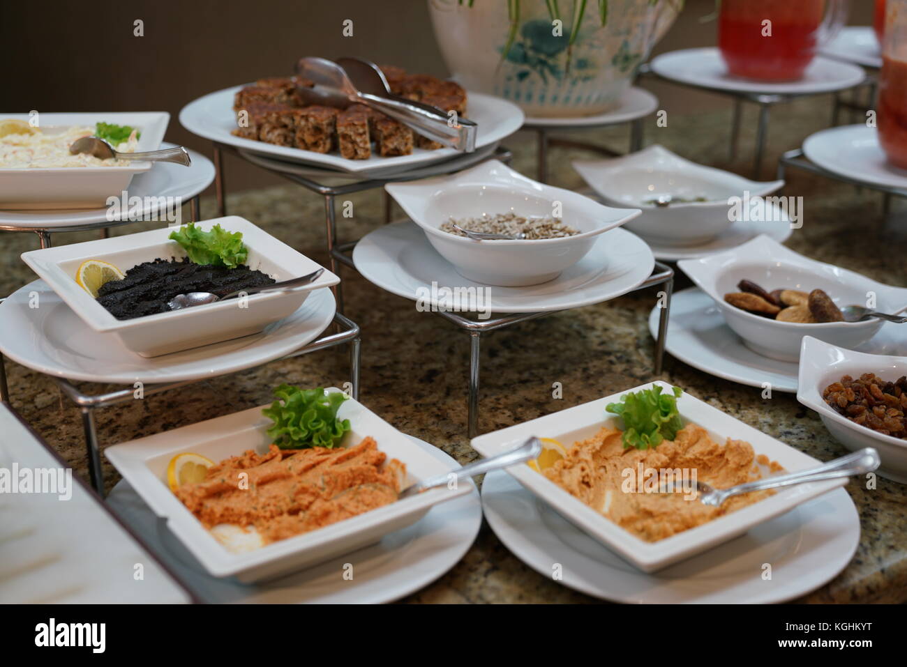 Dinner buffet with hummus and vegetables and candy Stock Photo - Alamy