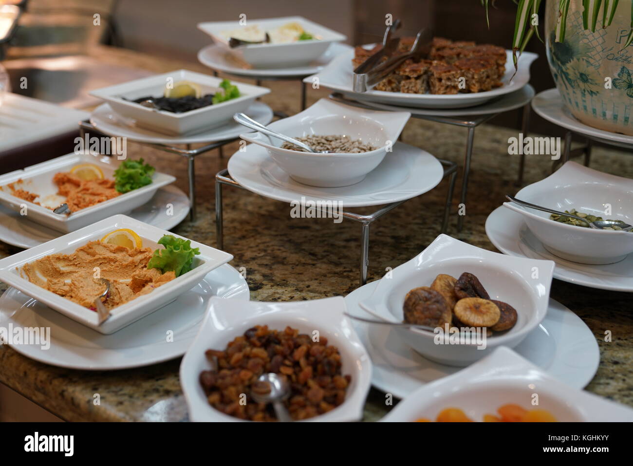 Dinner buffet with hummus and vegetables and candy Stock Photo - Alamy